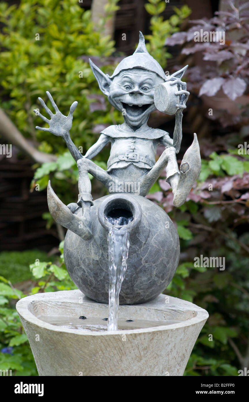 laughing elf water feature garden Stock Photo - Alamy