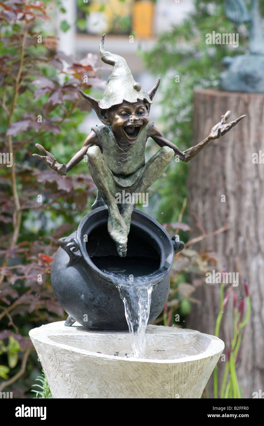 laughing elf water feature garden Stock Photo - Alamy