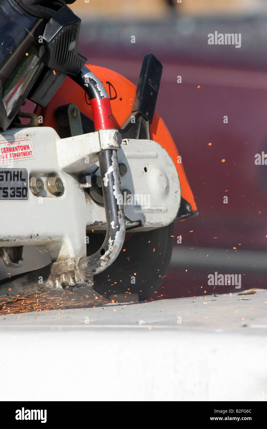 A tool cutting into a car during extrication Stock Photo - Alamy