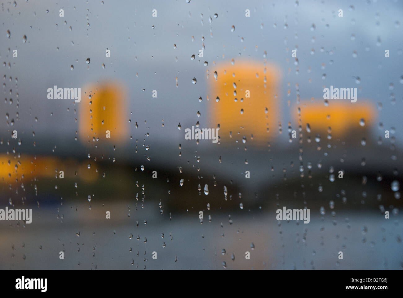 Looking through a window marked with rain drops towards Waterloo Bridge ...