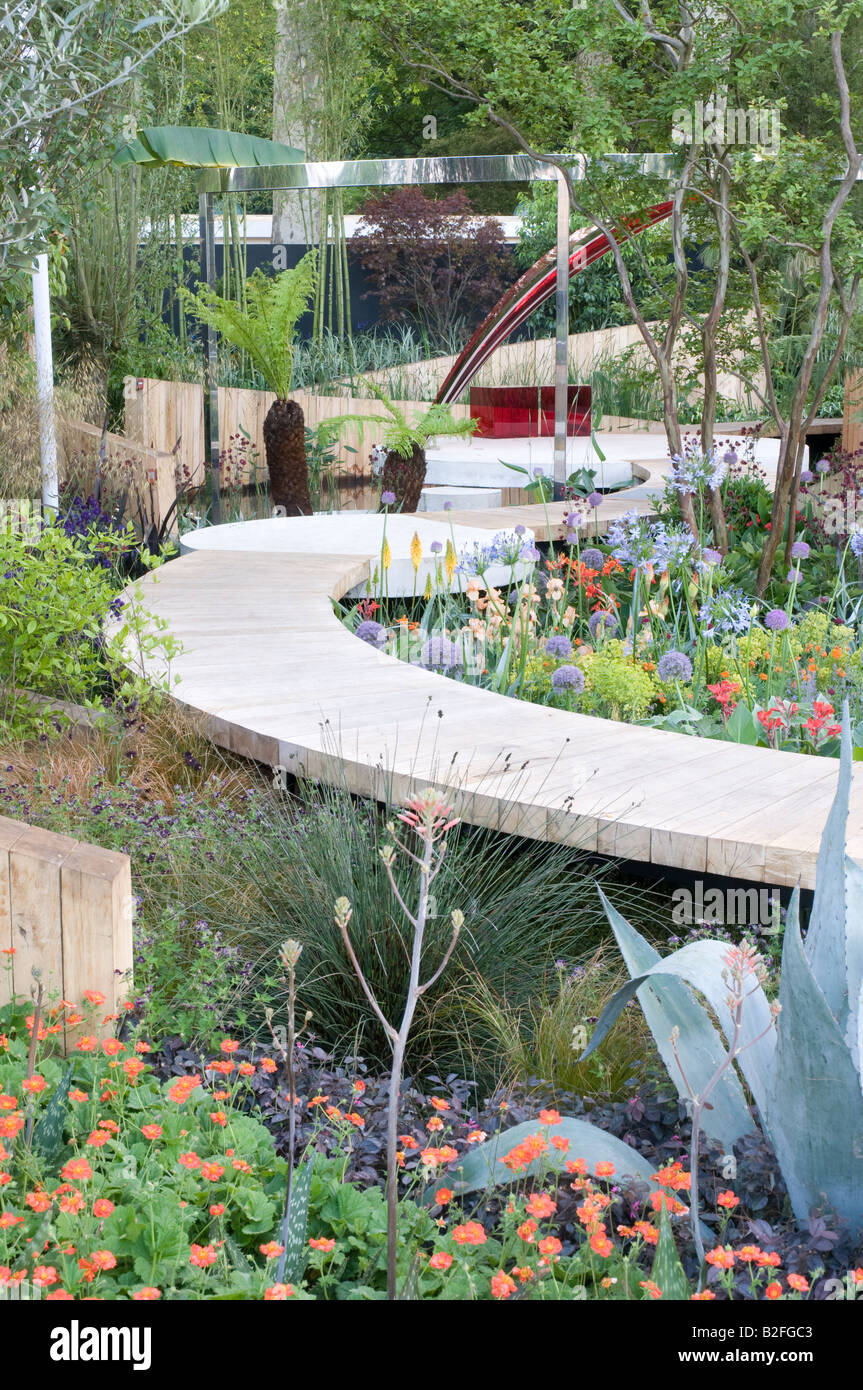 Pathway through flowering plants and textures Stock Photo - Alamy