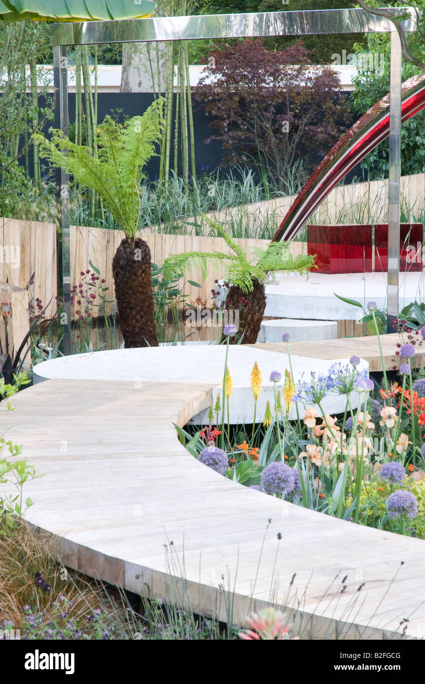 Pathway through flowering plants and textures Stock Photo - Alamy