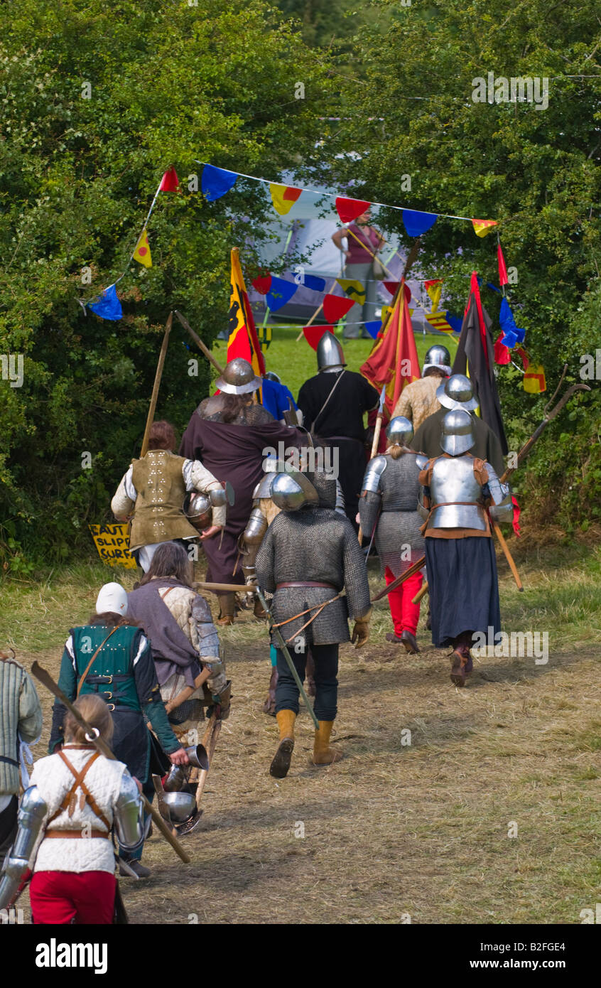 Soldiers in armour march from battle at Tewkesbury Medieval Festival ...