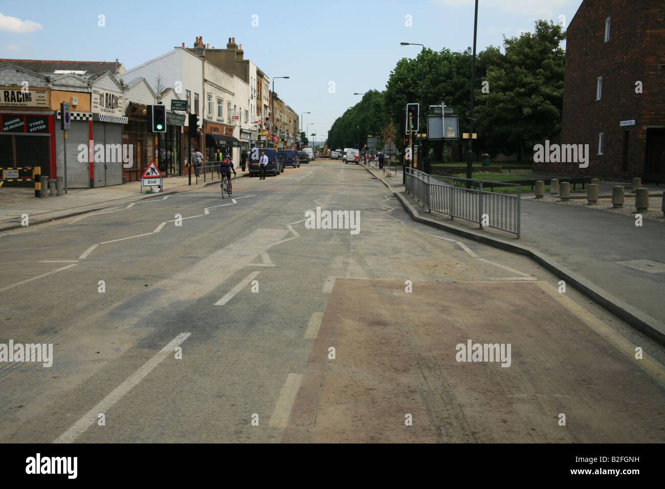 Merton High Street closed after a burst water main Stock Photo - Alamy