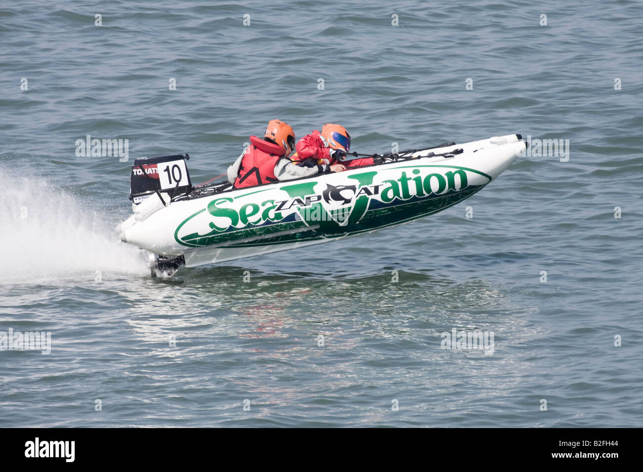 A racing ZapCat inflateable catamaran speedboat airborne from the waves ...