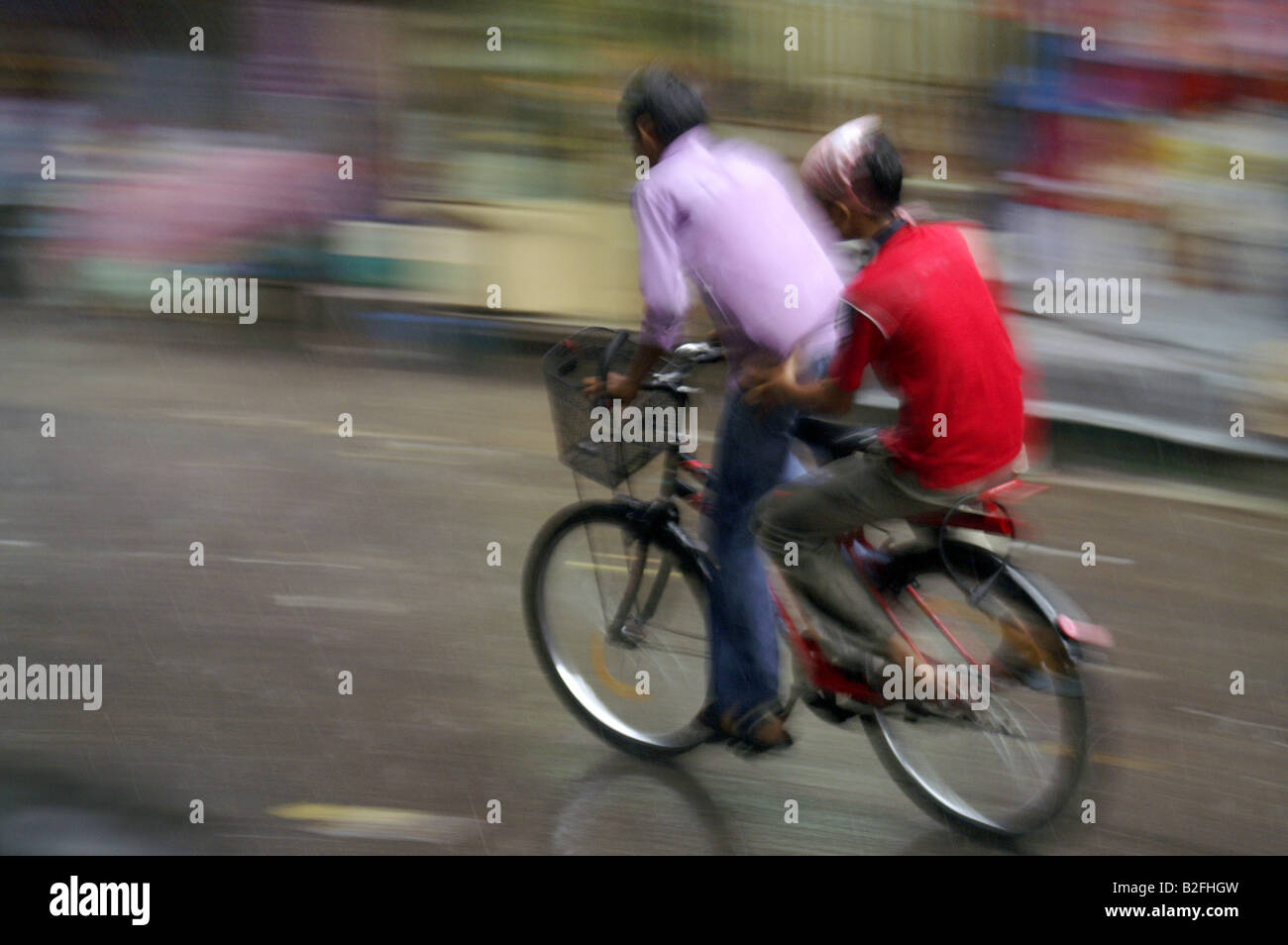 Couple riding bicycle india hi-res stock photography and images - Alamy