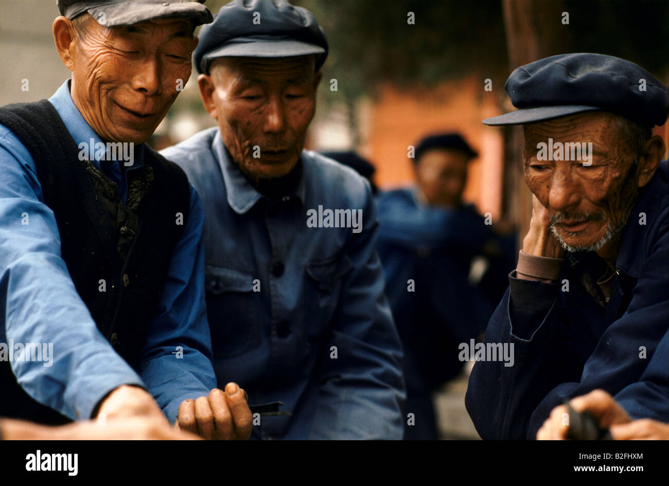Chinese men playing a game Stock Photo - Alamy