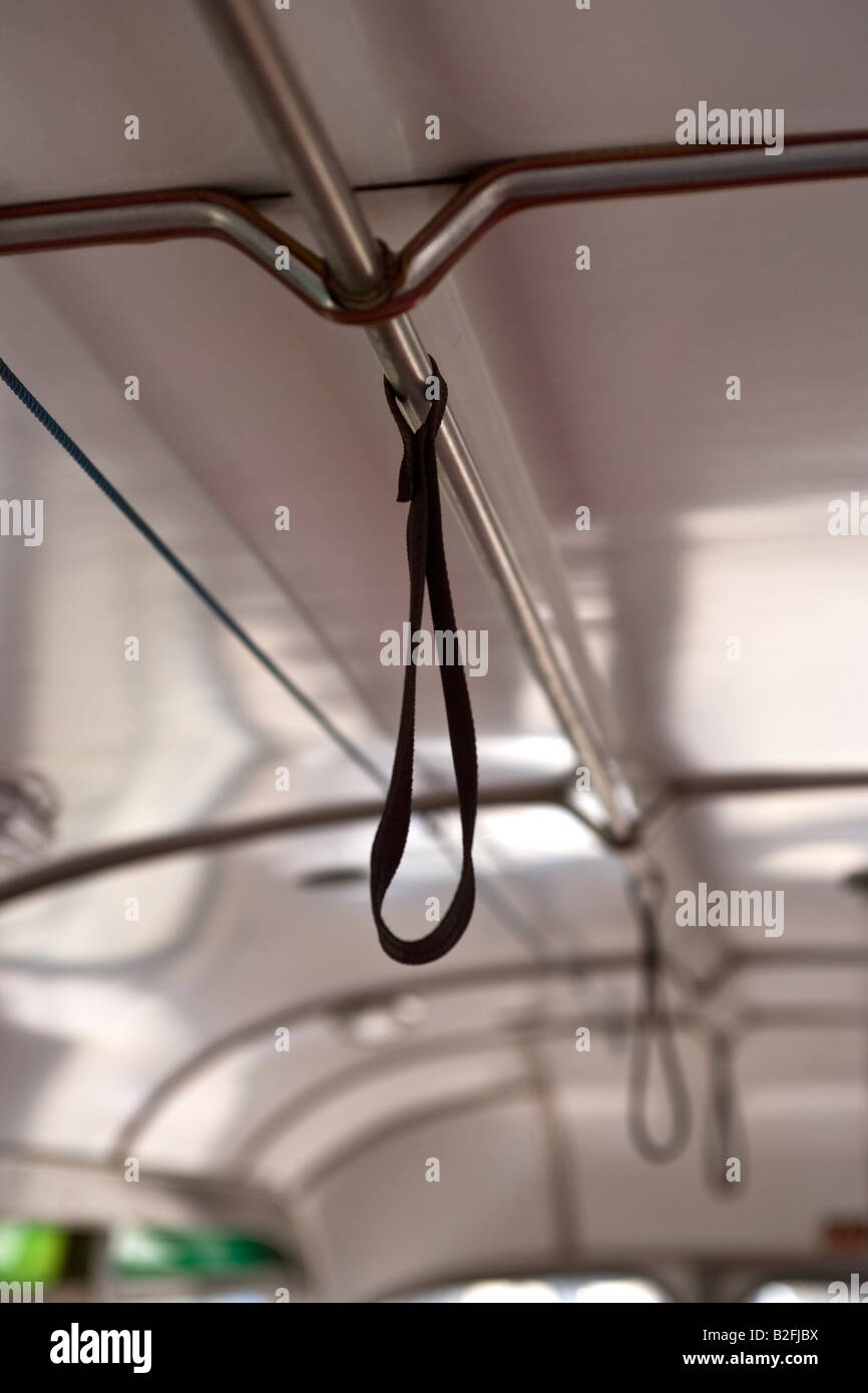Hanging bus strap hi-res stock photography and images - Alamy