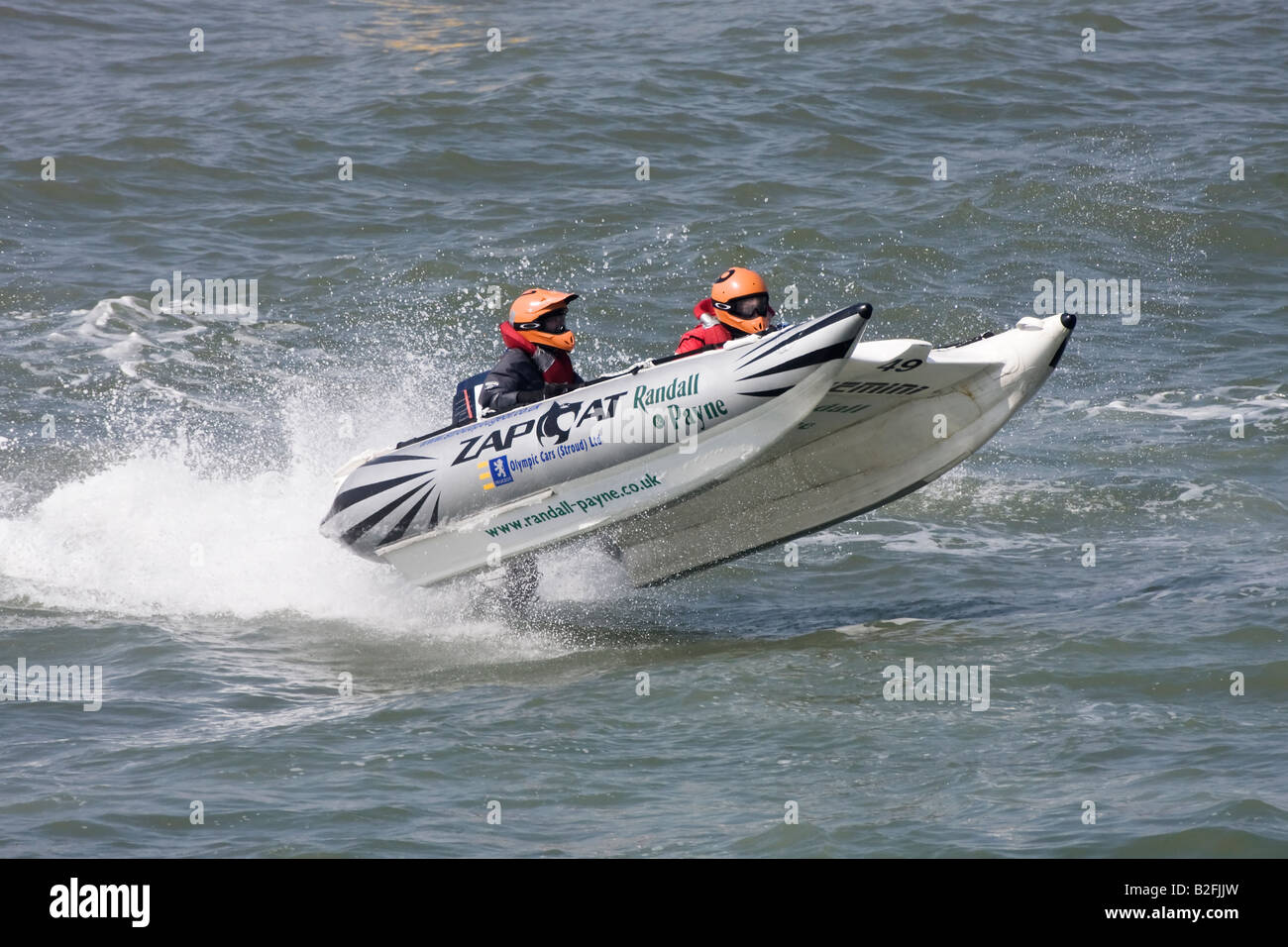A racing ZapCat inflateable catamaran airborne from the waves Stock ...