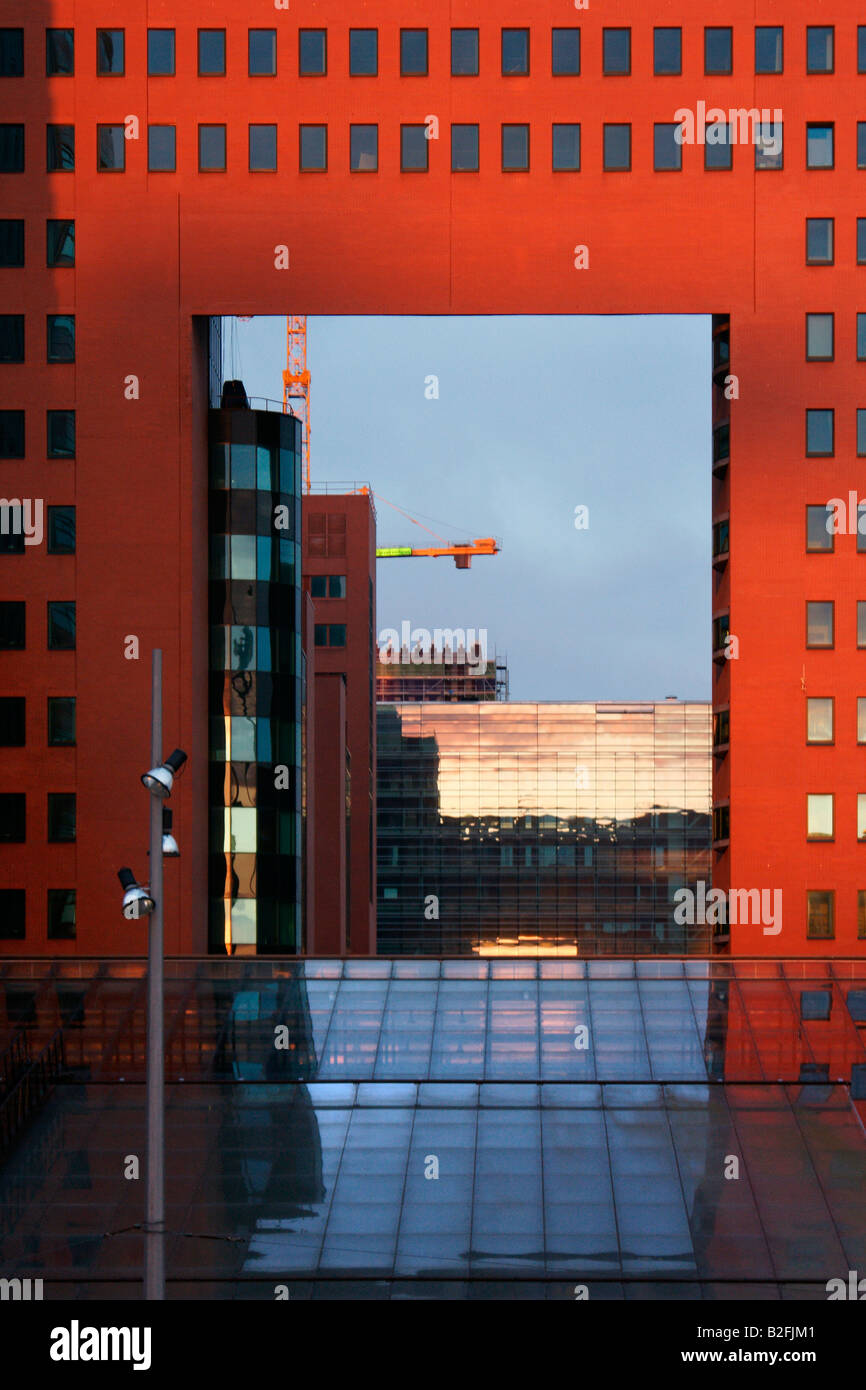 Rectangular opening hole in red facade of Dutch Tax Office building ...