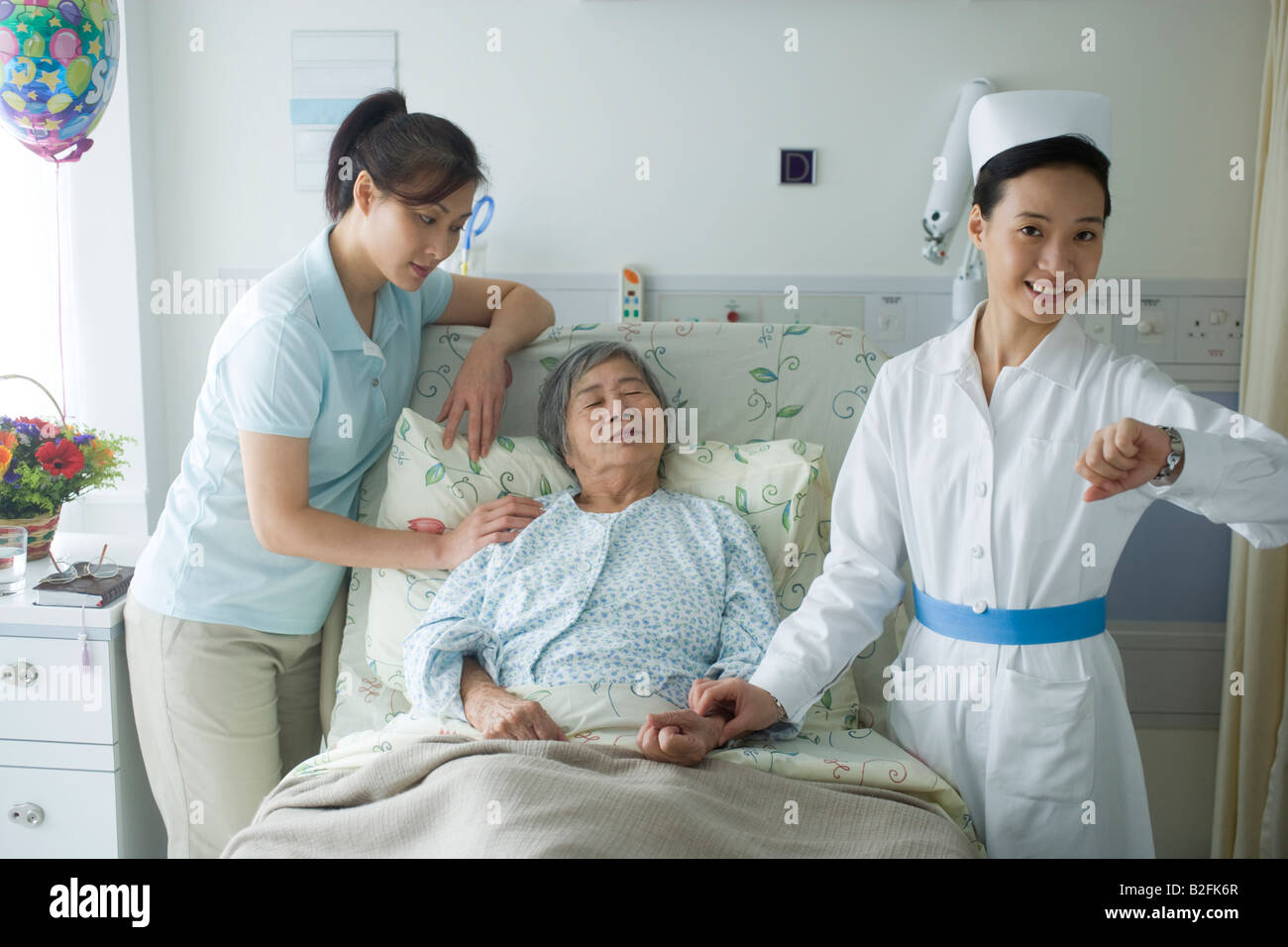 Nurse Taking Pulse