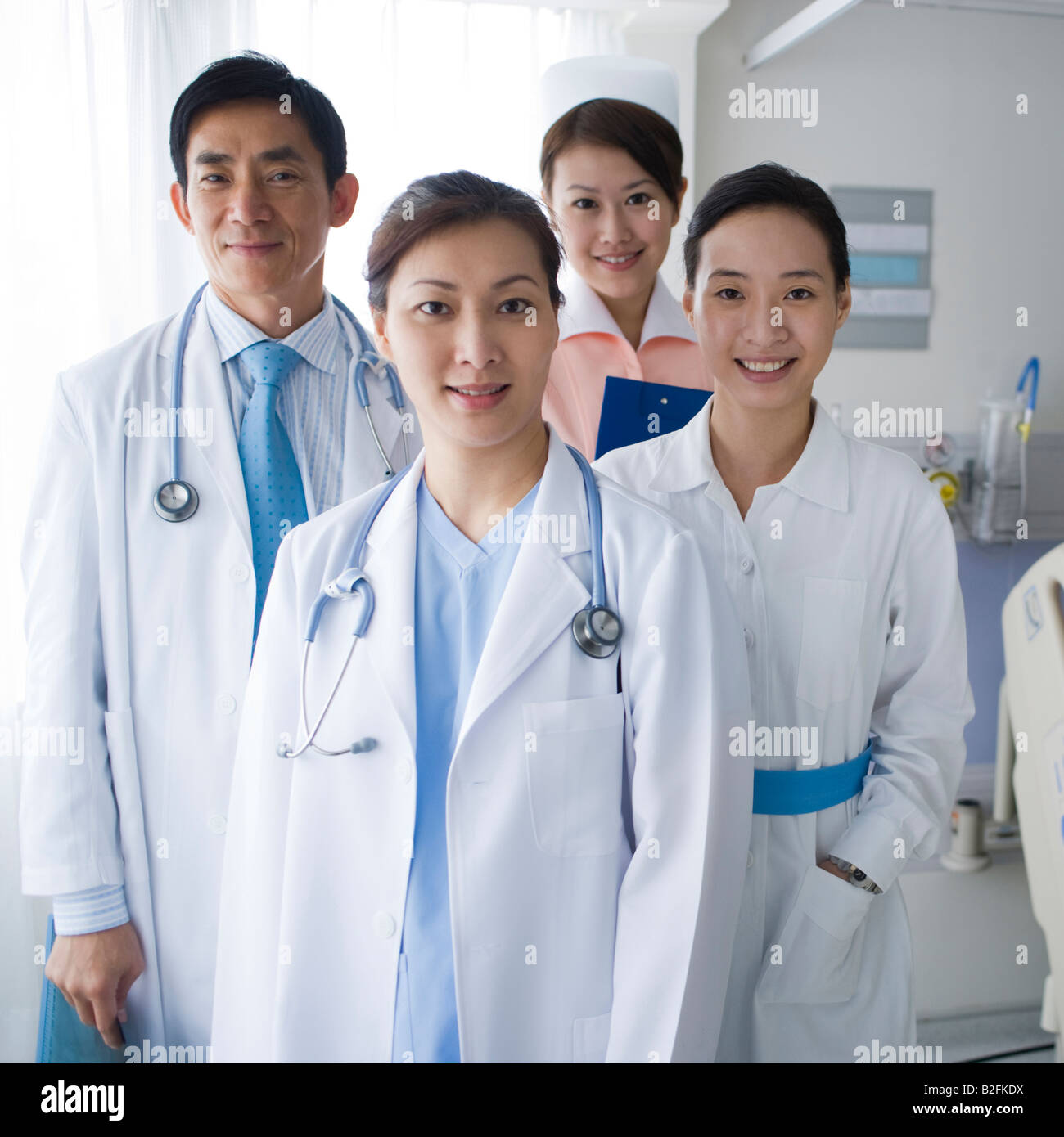 Portrait of medical staff standing together and smiling Stock Photo - Alamy