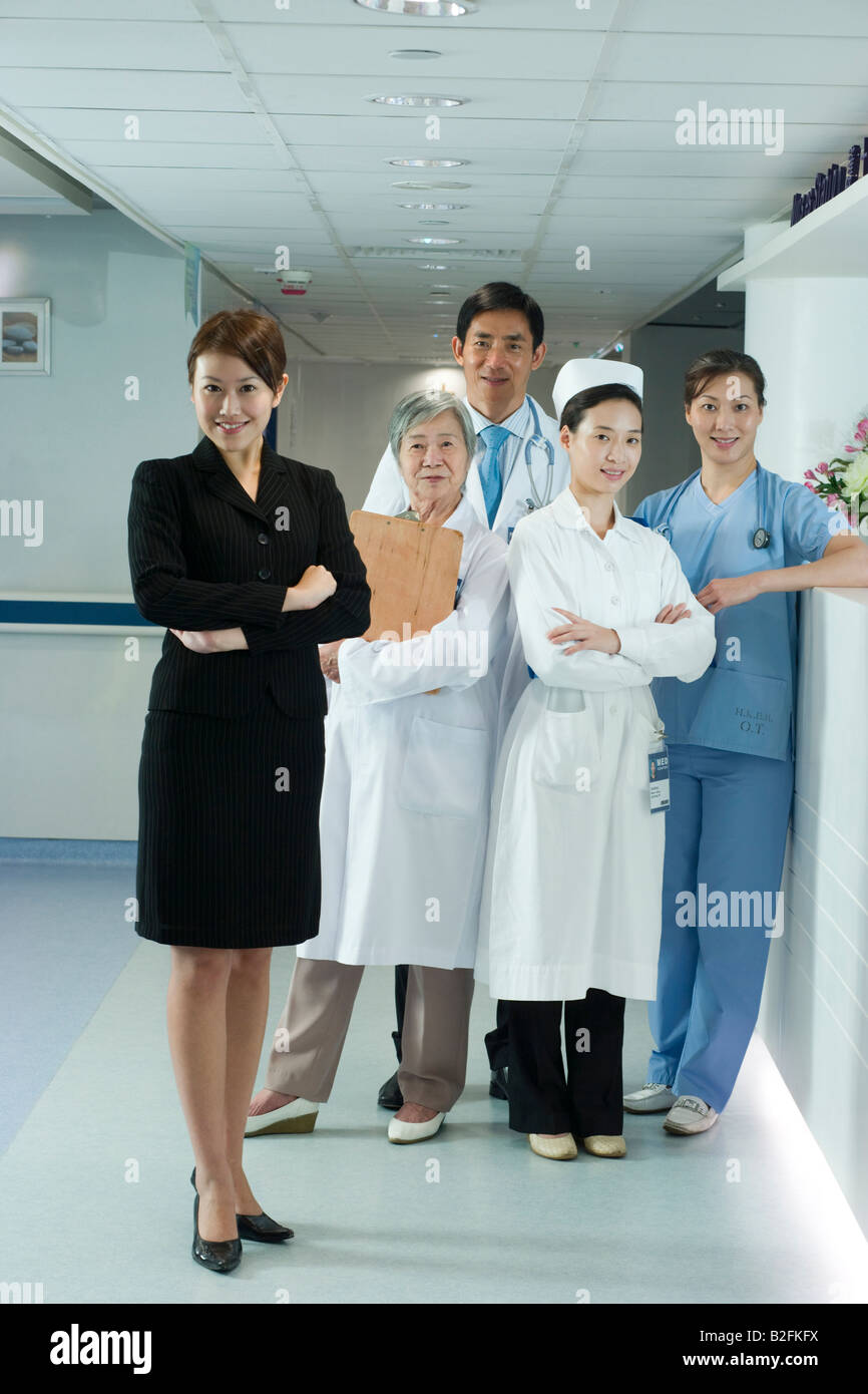 Portrait of medical staff standing in a corridor Stock Photo - Alamy
