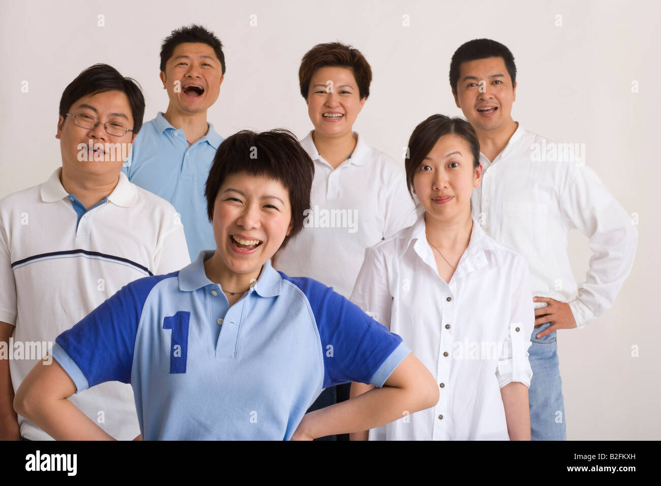 Portrait of three mid adult couples standing together Stock Photo - Alamy