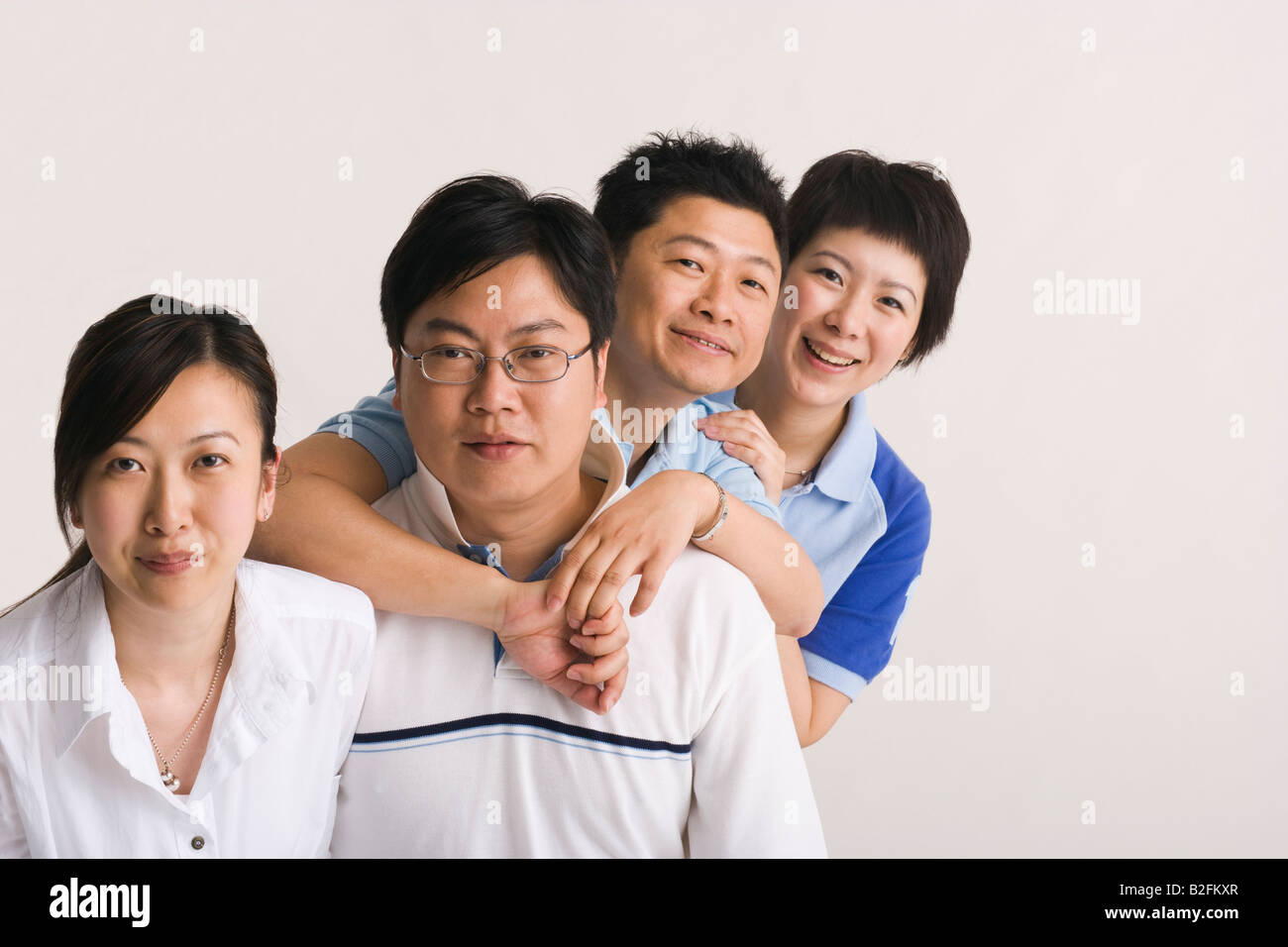 Portrait of two mid adult couples Stock Photo - Alamy
