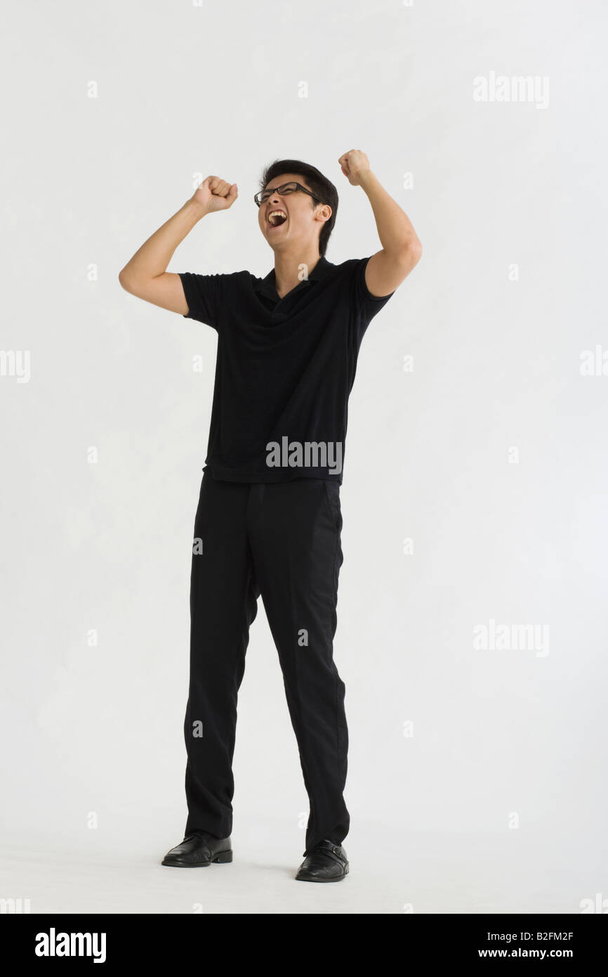 Blissful man standing arms hi-res stock photography and images - Alamy