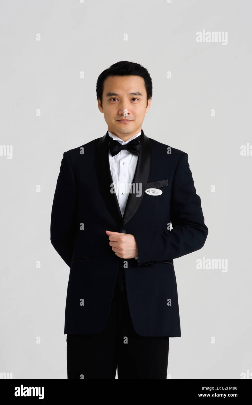 Portrait of a waiter standing Stock Photo - Alamy