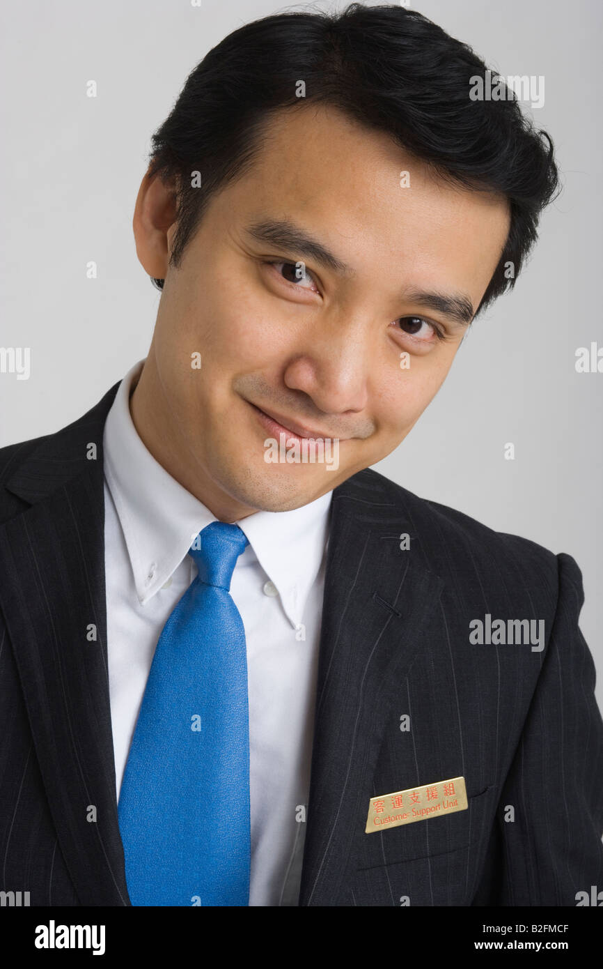 Portrait of a businessman smiling Stock Photo - Alamy