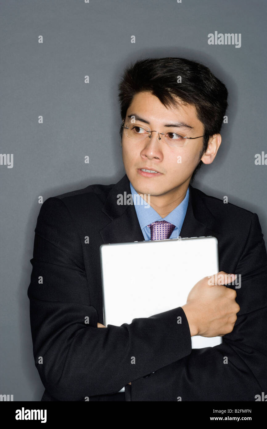 Businessman hugging his computer hi-res stock photography and images ...