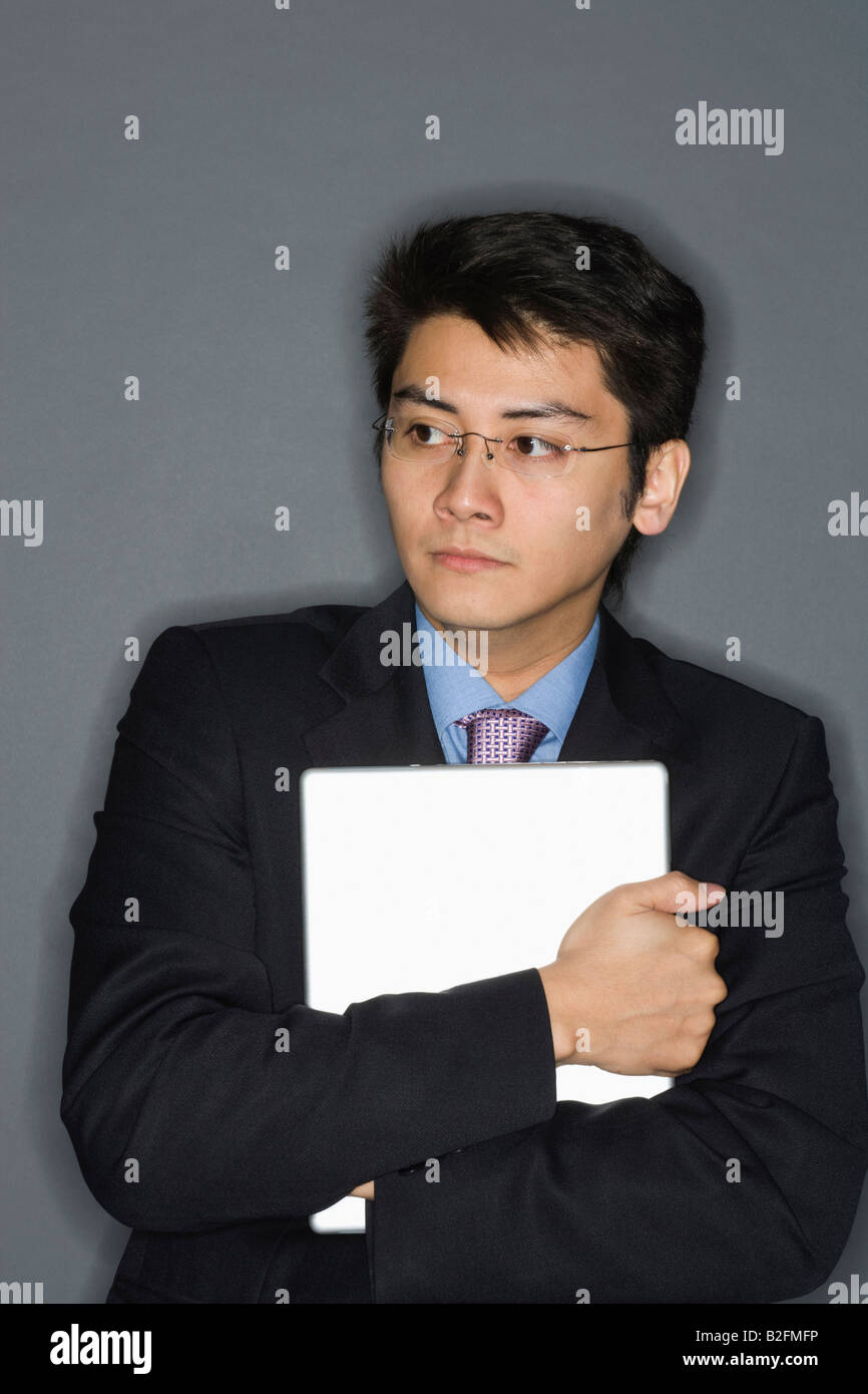 Businessman hugging his computer hi-res stock photography and images ...
