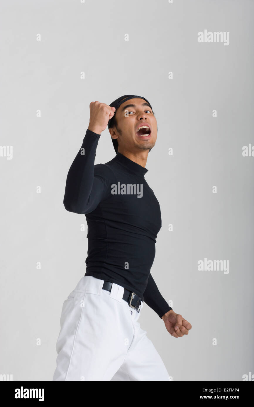 Portrait of a young man shouting Stock Photo - Alamy