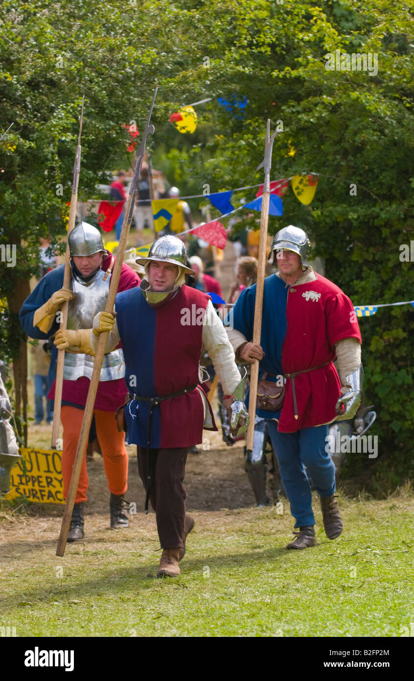 Soldiers in armour march from battle at Tewkesbury Medieval Festival ...