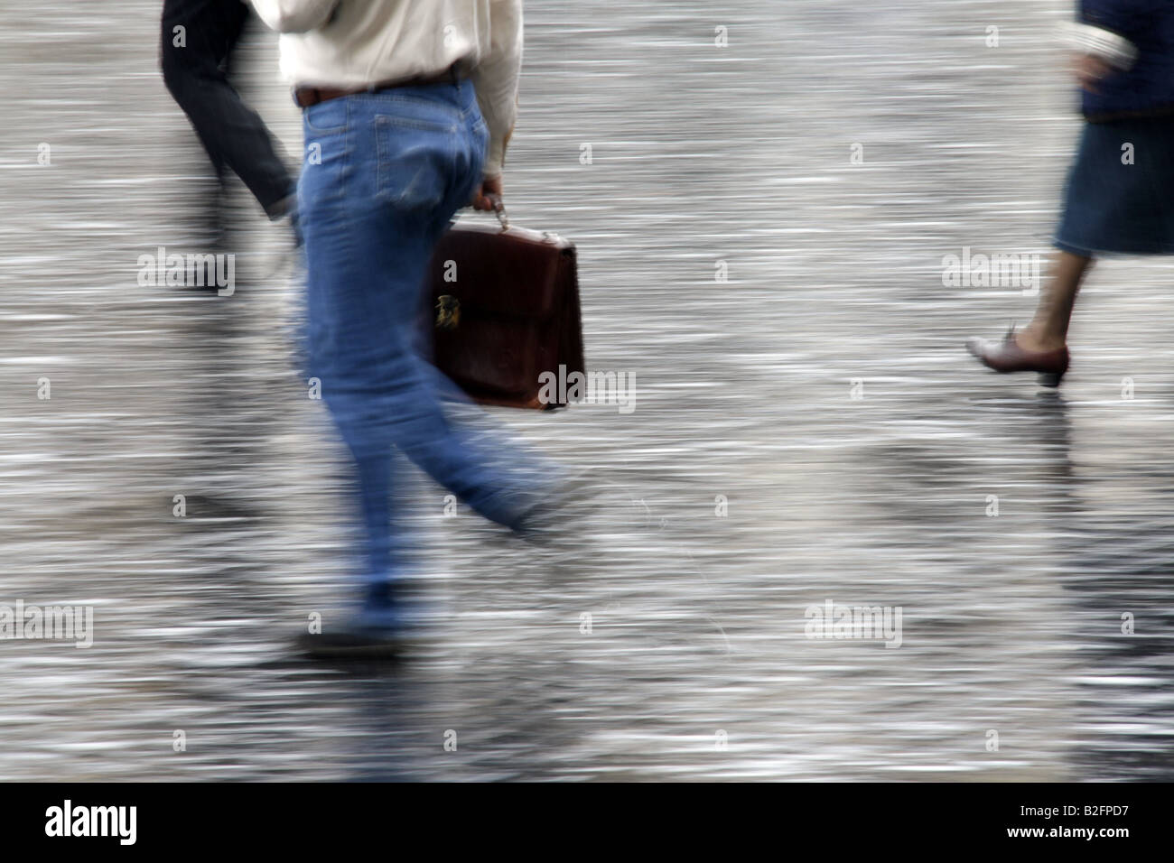 male commuter with briefcase running fast in town Stock Photo - Alamy