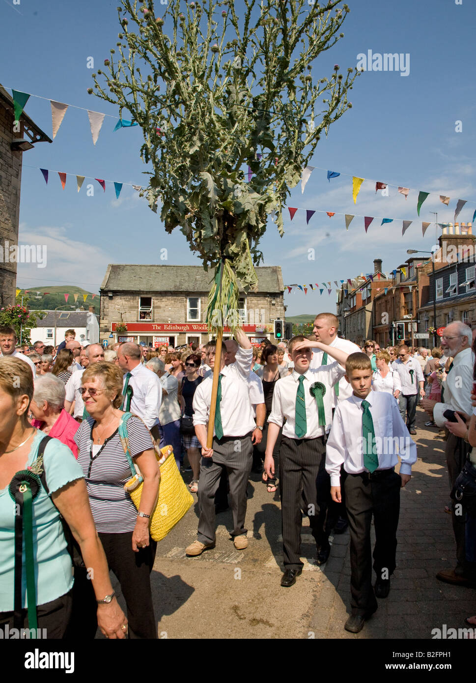 People Carrying The Giant Thistle Emblem At The Langholm Common Riding ...