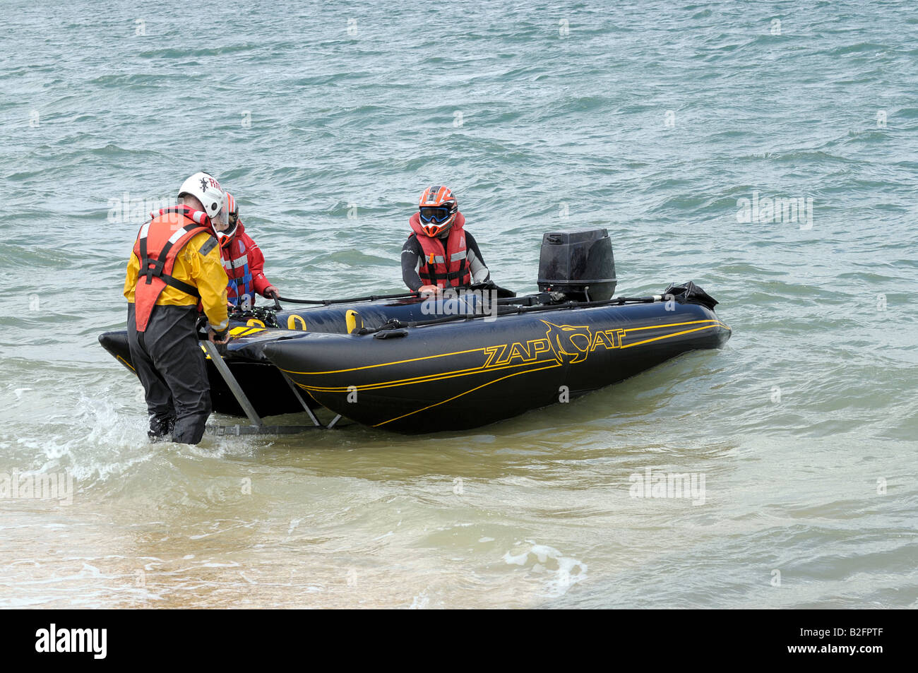 Taking a zapcat out of the water Stock Photo - Alamy
