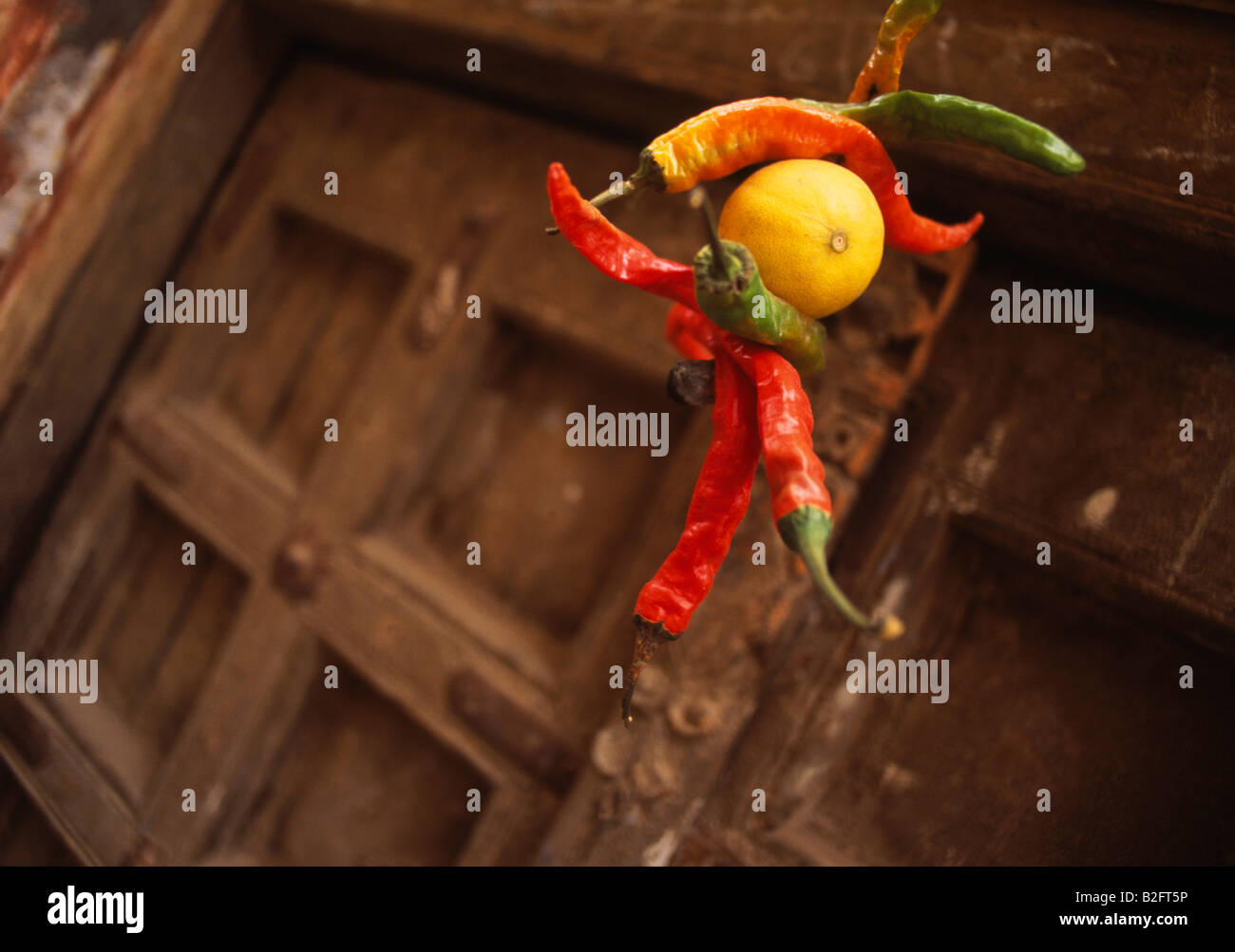 Lemon and chili hanging in door hi-res stock photography and images - Alamy