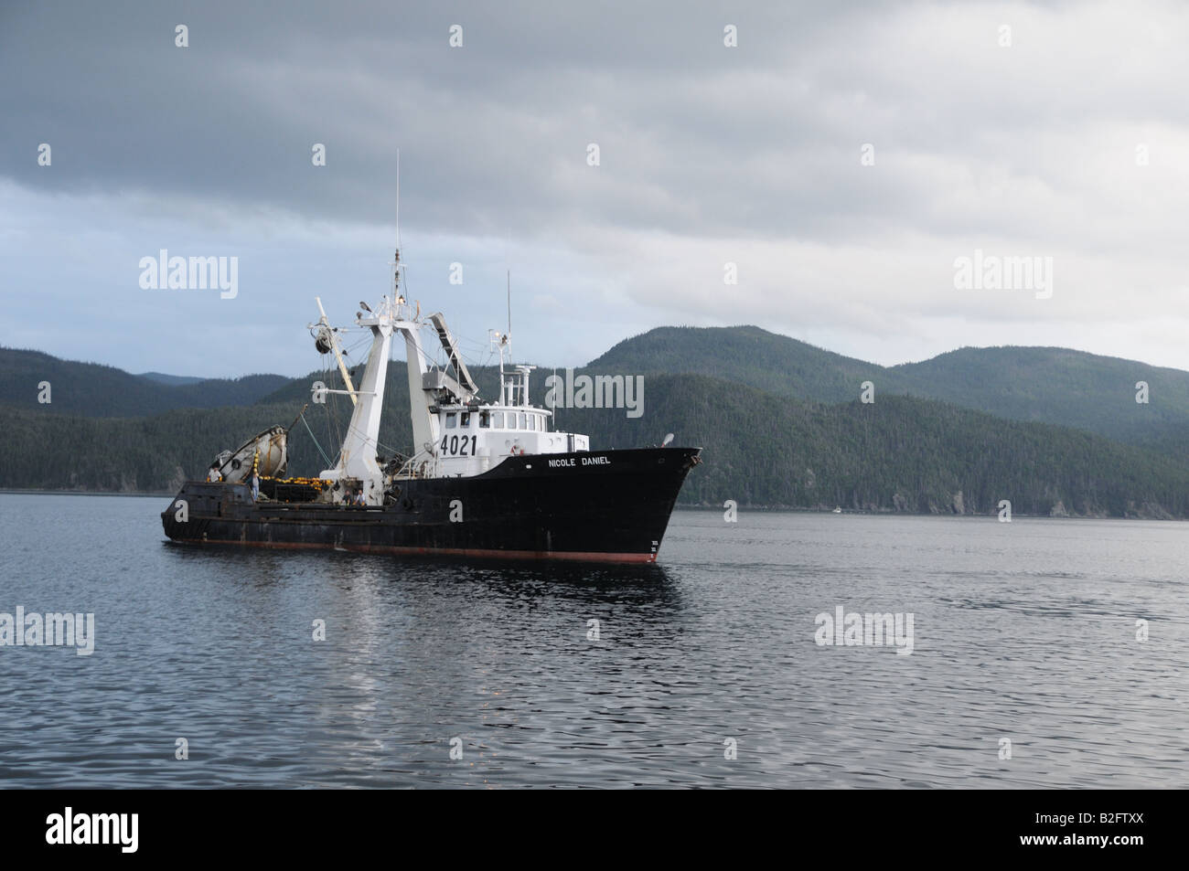 A fishing boat on Bonne Bay in Woody Point, Newfoundland Stock Photo ...