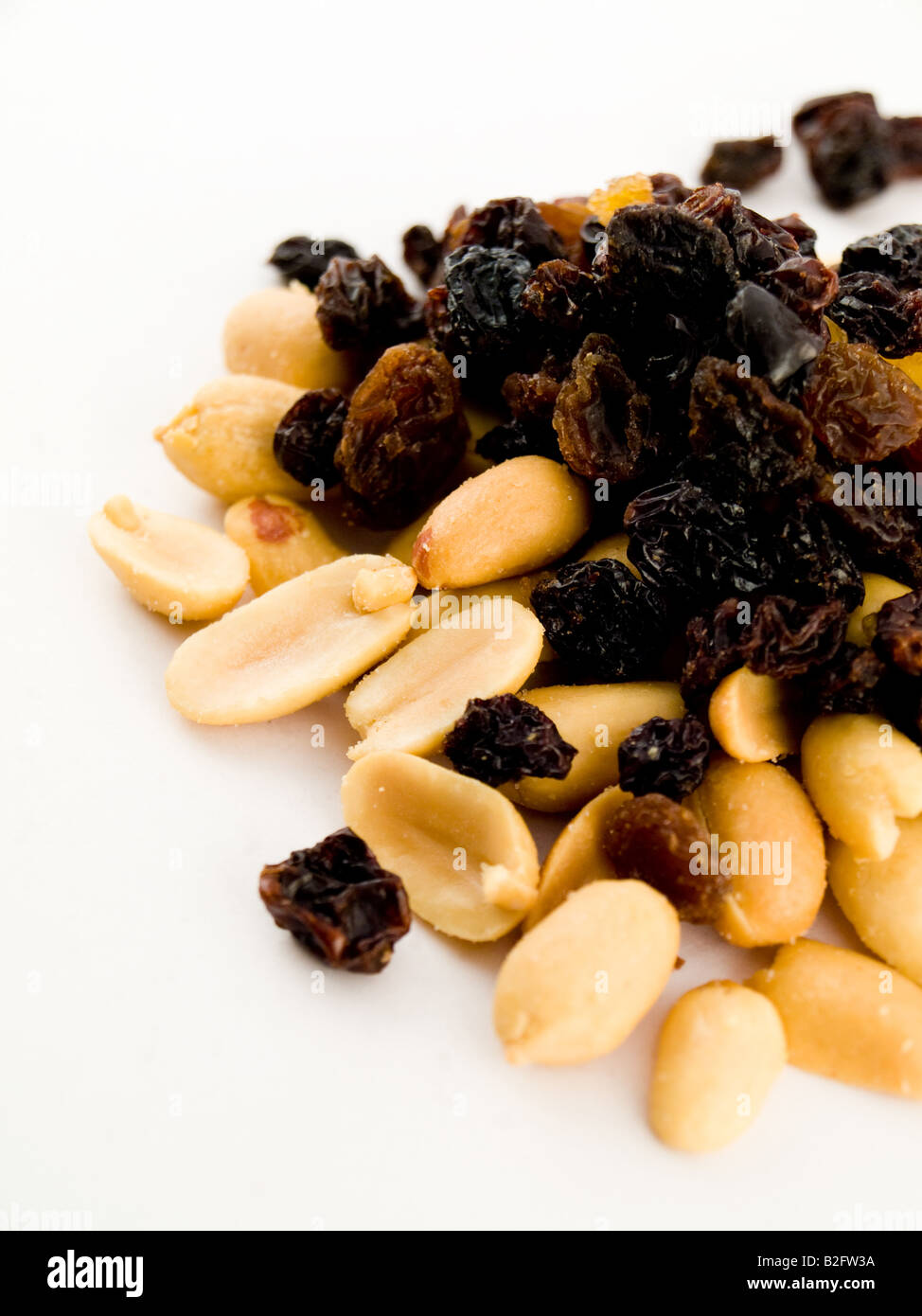 Stack Pile of Peanuts and Raisins on White Background No Shells or ...