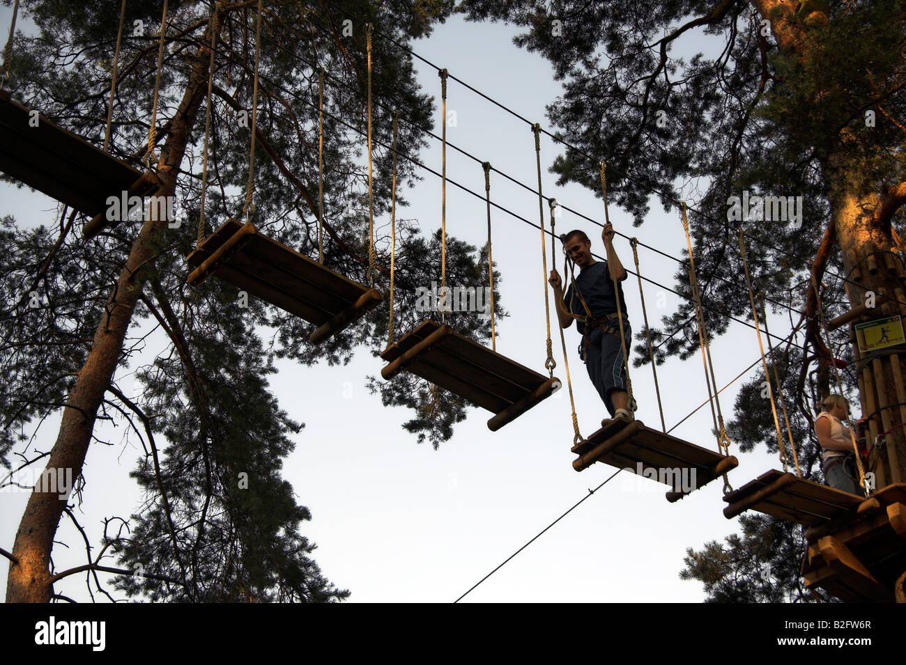 Person on a rope bridge, Go Ape Adventure Course, Delamere Forest ...