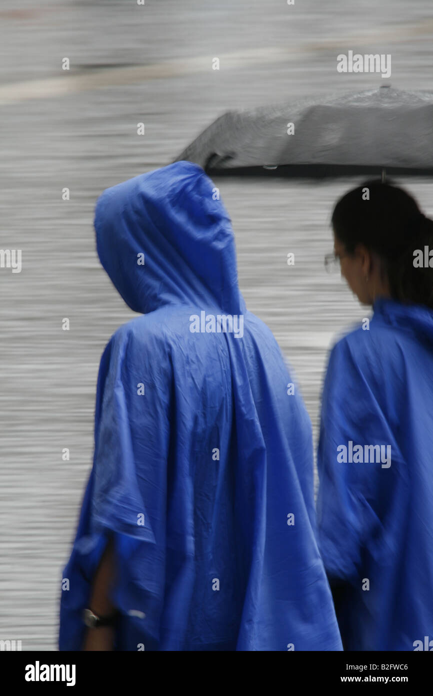 People In Rain Capes High Resolution Stock Photography and Images - Alamy
