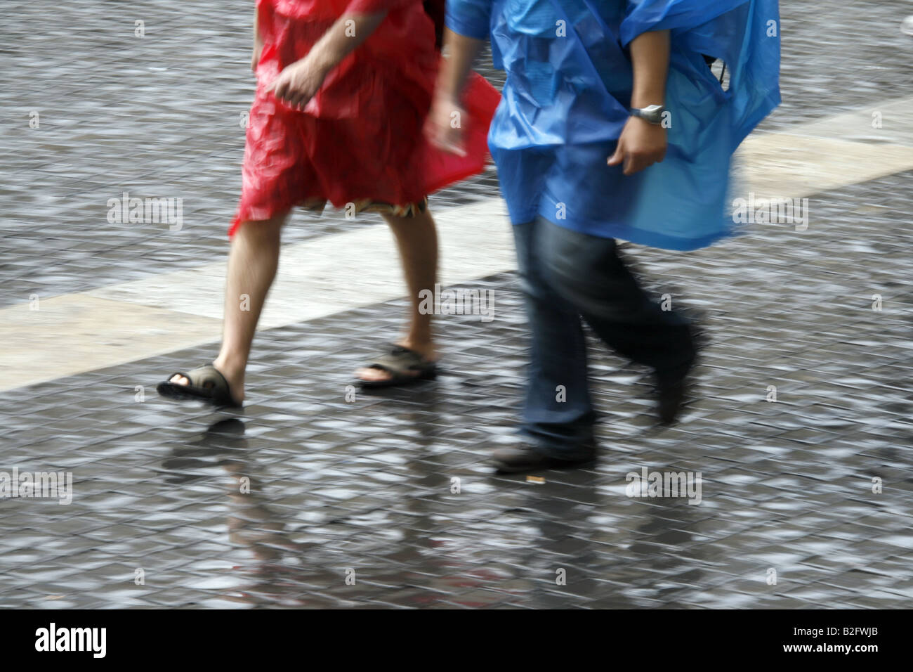 People in rain capes hi-res stock photography and images - Alamy