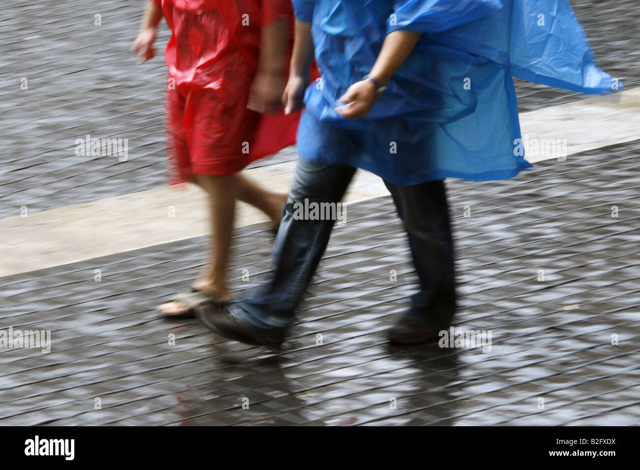 People in rain capes hi-res stock photography and images - Alamy