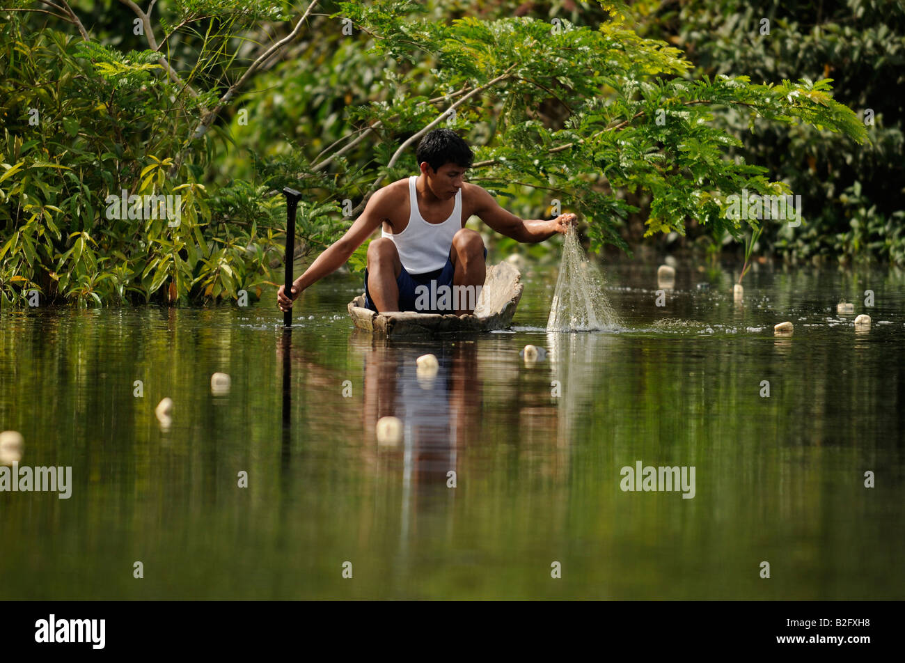 Fisherman in the Amazon rainforest Stock Photo - Alamy