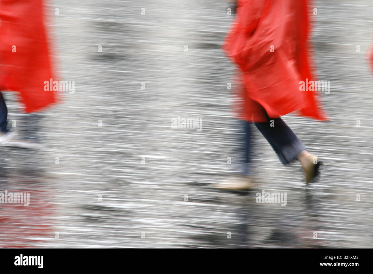 People in rain capes hi-res stock photography and images - Alamy