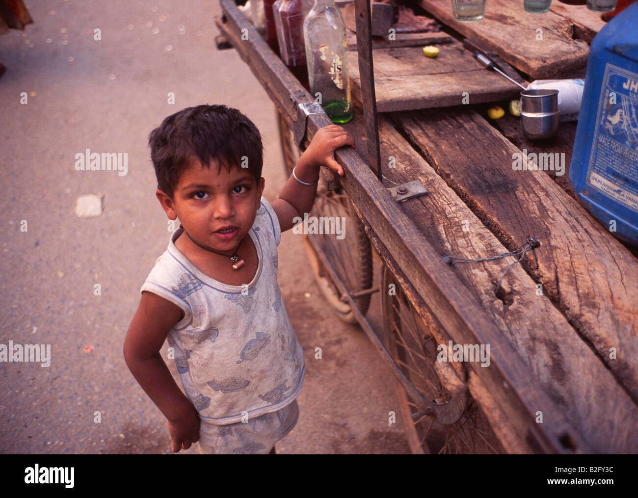 Indian boy begging, Delhi, India Stock Photo - Alamy
