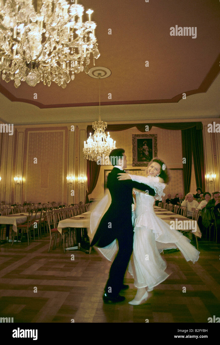 couple waltzing in a vienna ballroom Stock Photo - Alamy