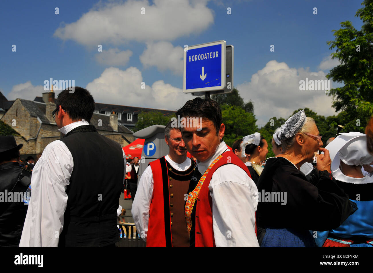 men and women dressed in traditional costume in Cornwall Festival in ...