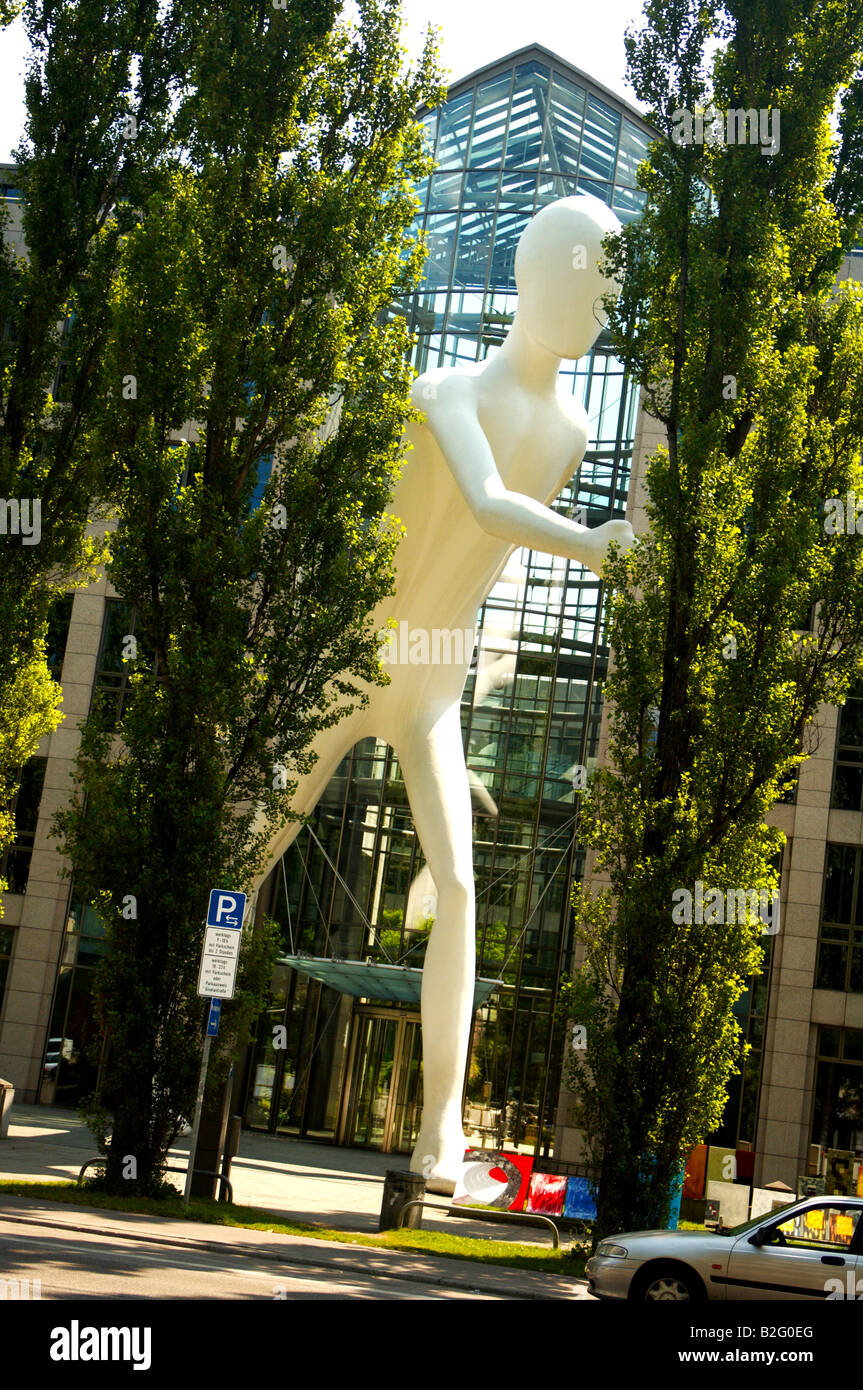 Walking Man sculpture in Munich Germany Stock Photo - Alamy