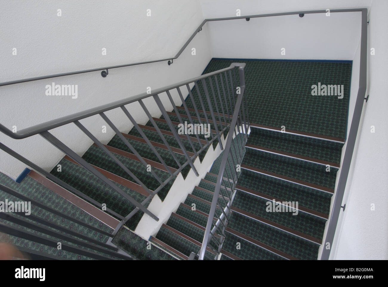 An empty stairwell in a building Stock Photo - Alamy