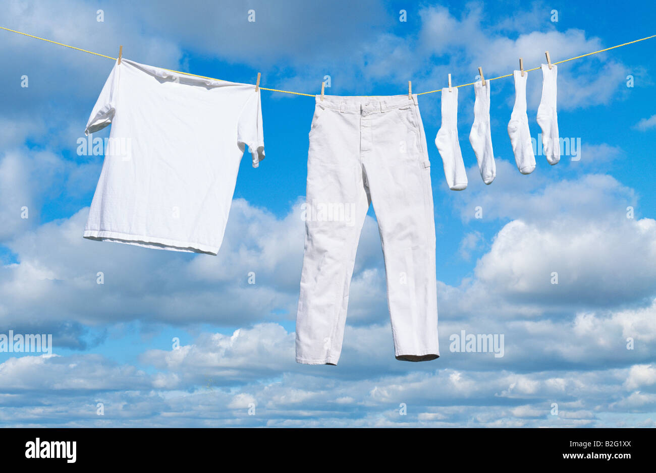 White clothes hanging on clothes line Stock Photo - Alamy