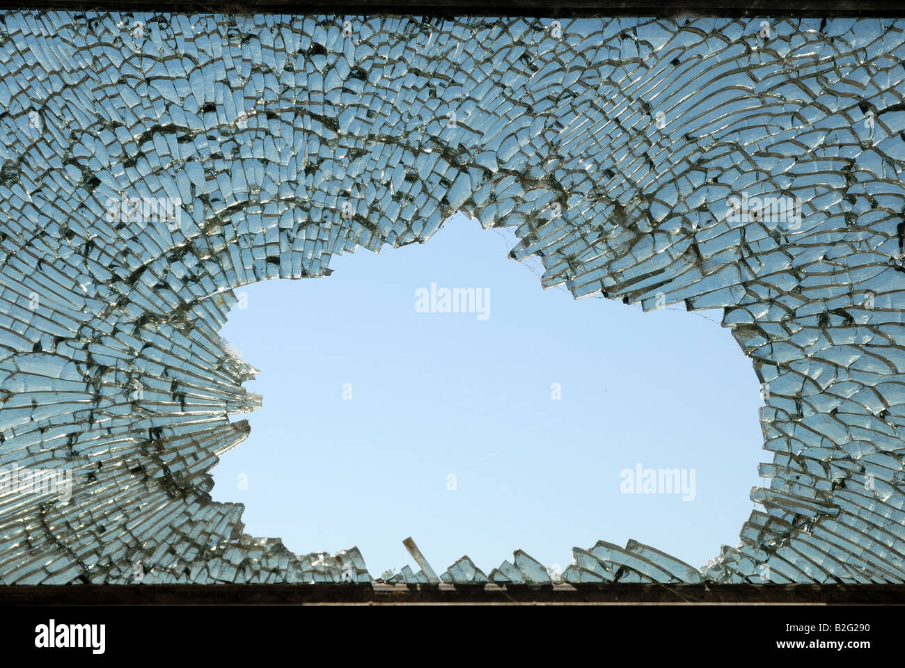 Crushed blue toned glass closeup Stock Photo - Alamy