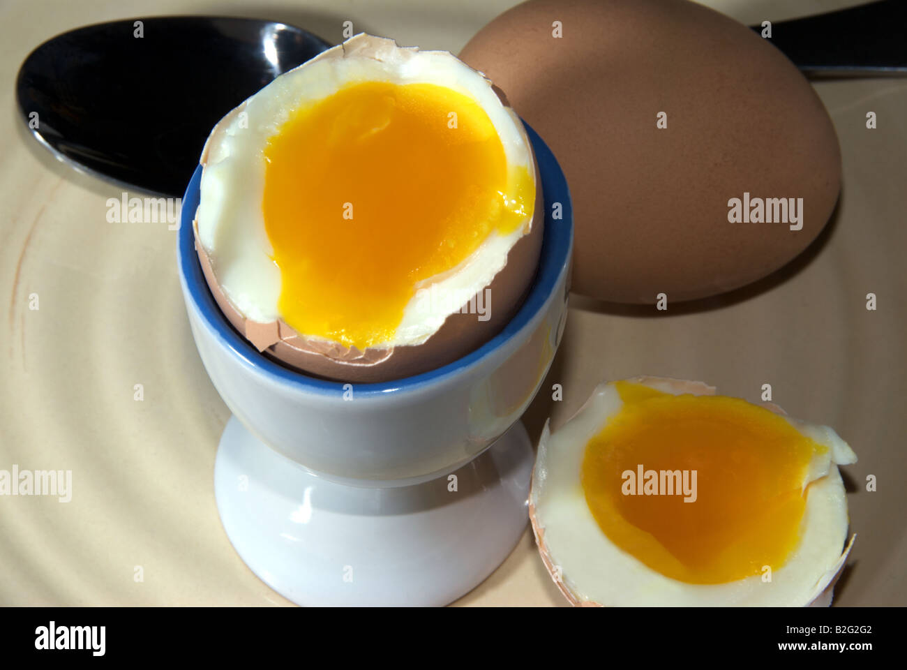 Boiled organic brown egg Stock Photo - Alamy