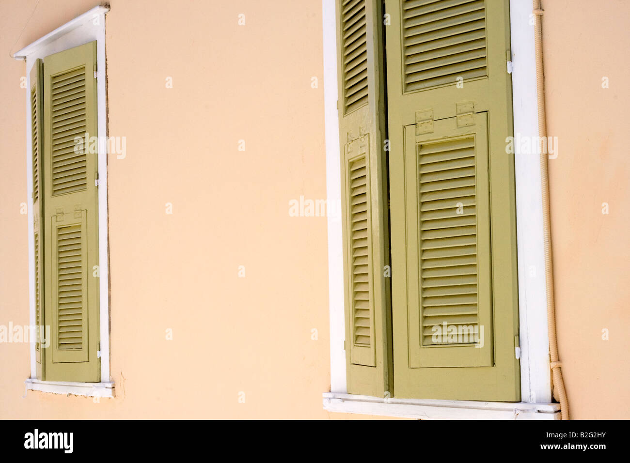 Closed shutters at a Greek homes during siesta time Stock Photo - Alamy