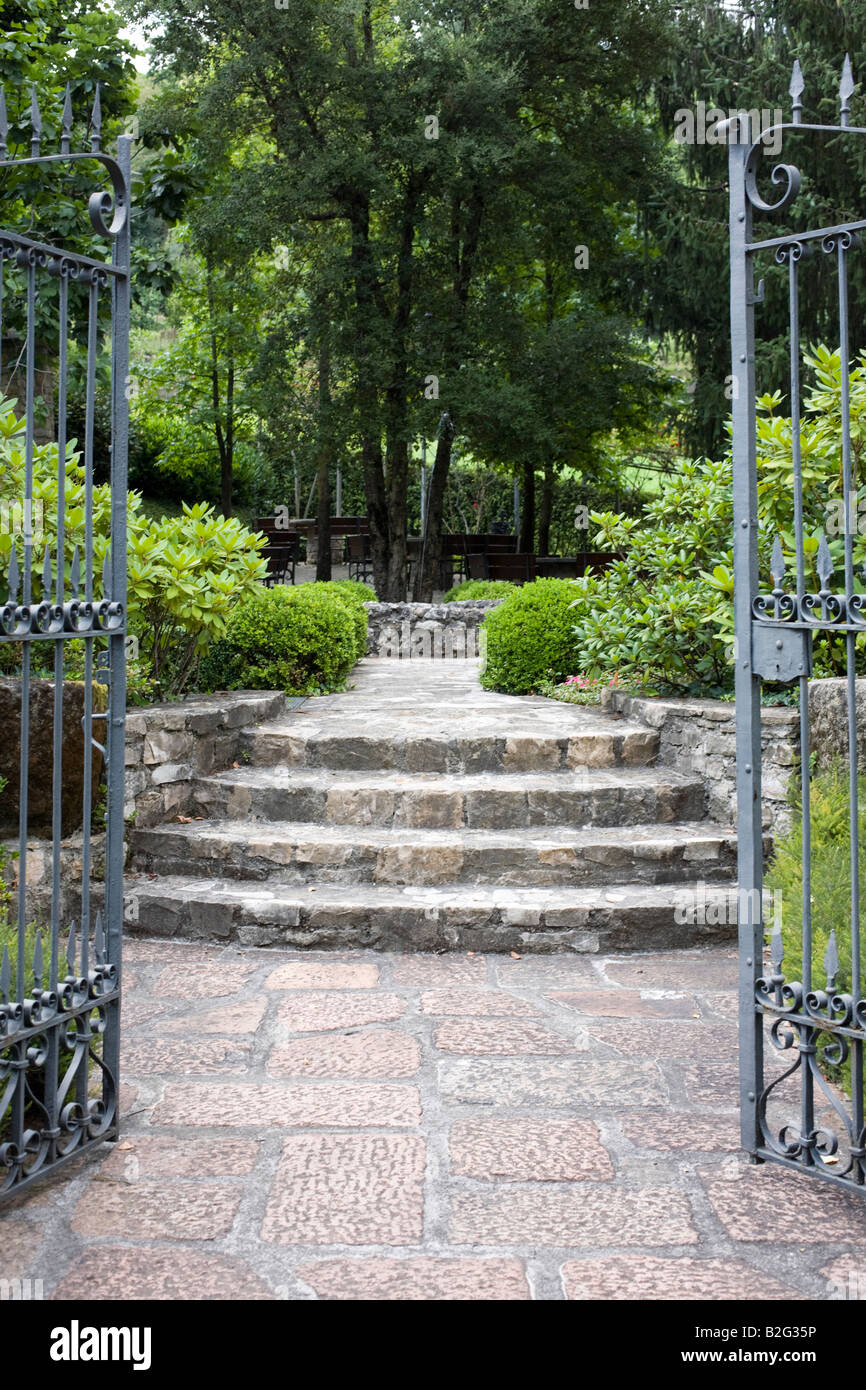 Romantic openings: antique gate opening on beautiful garden Stock Photo ...
