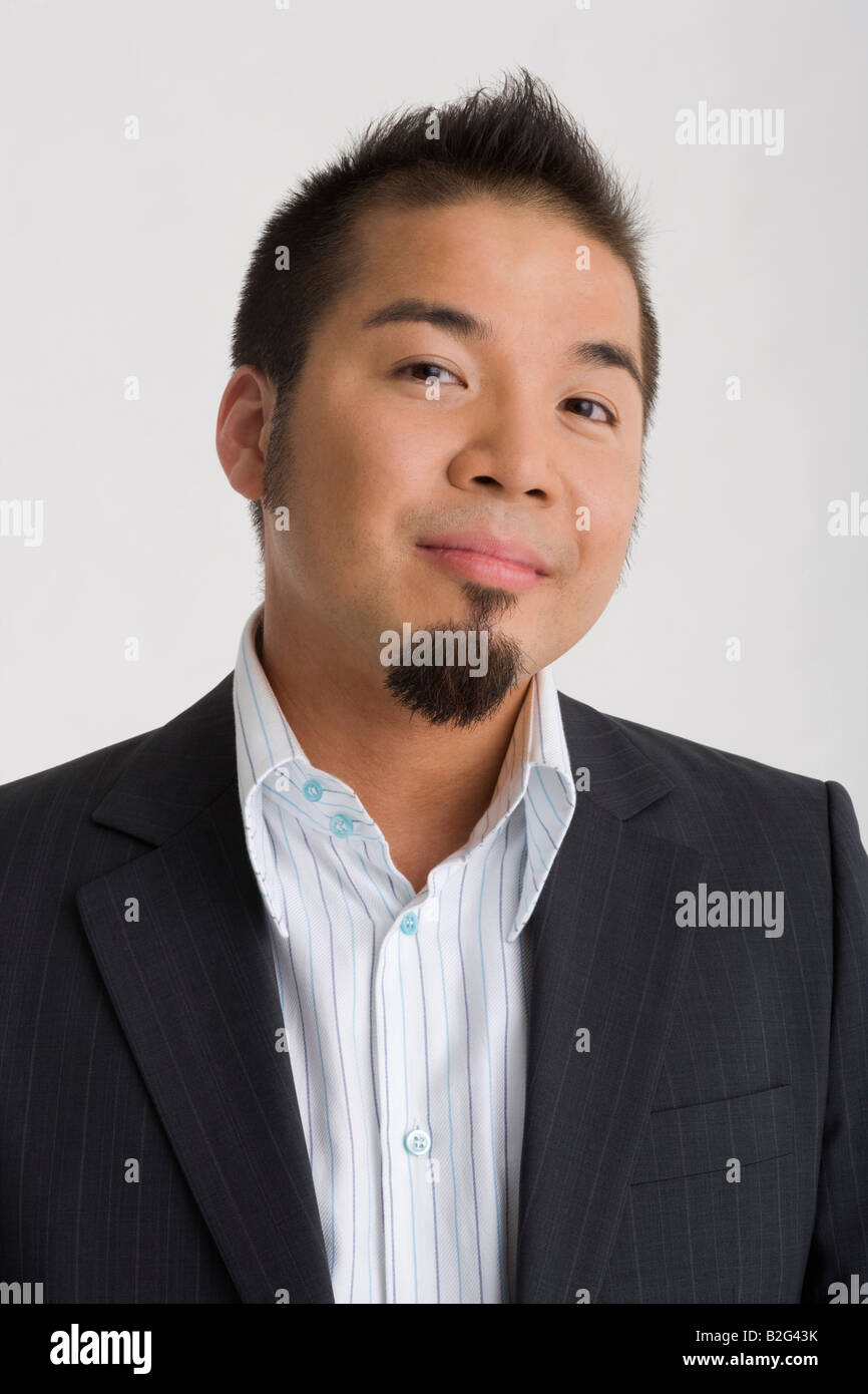 Grinning chinese man hi-res stock photography and images - Alamy