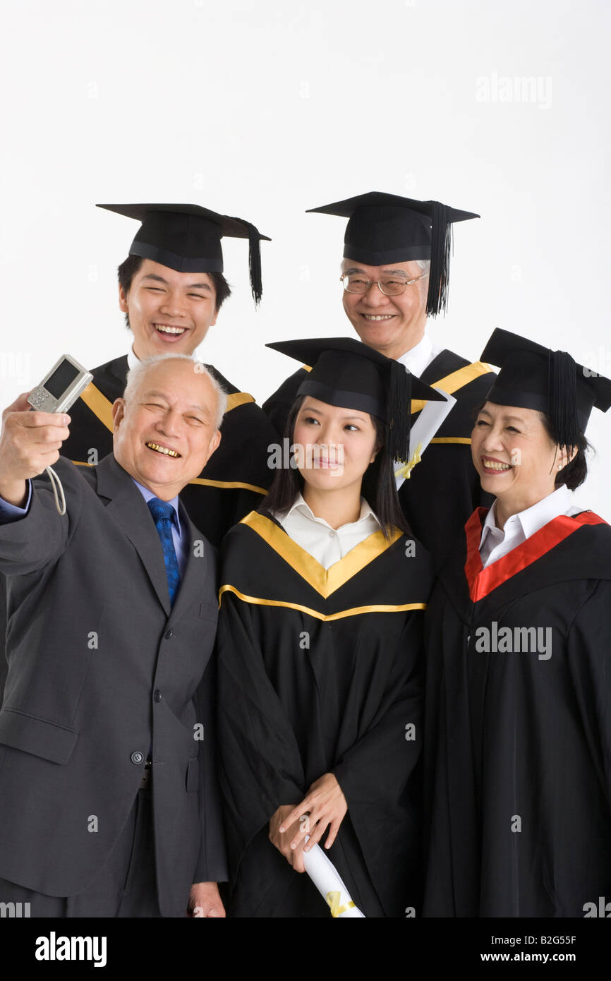 Professor with his students photographing themselves Stock Photo - Alamy